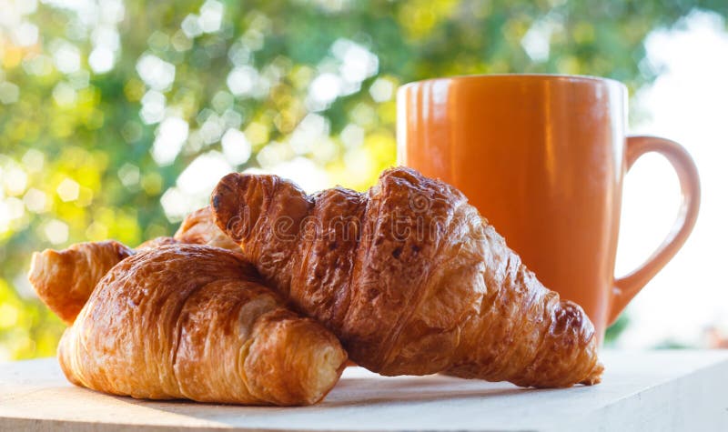Croissants and Mug of Coffee Stock Image - Image of outside, saucer ...