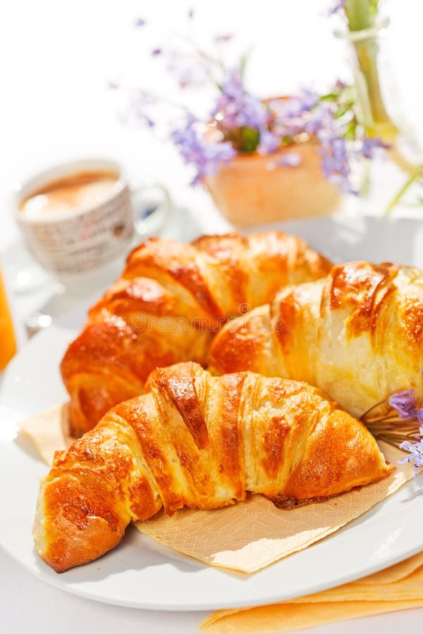 Croissants on plate stock image. Image of bakery, buttered - 39884067