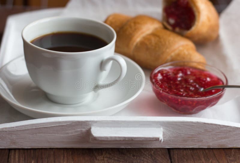 Croissants with Raspberry Jam and Black Coffee Stock Photo - Image of ...