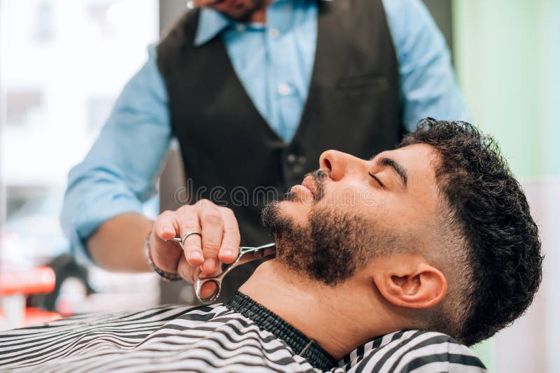 Crop Barber Cutting Beard at Barbershop Stock Photo - Image of cape ...