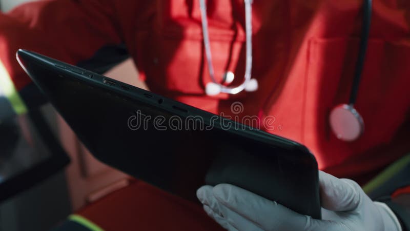 Unrecognizable Doctor Using Tablet in Ambulance Stock Video - Video of ...