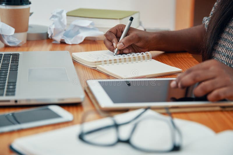Crop Businesswoman with Tablet Writing in Notepad Stock Image - Image ...
