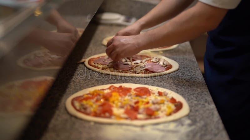 Crop Cook Decorating Pepperoni Pizza with Cheese Stock Footage - Video ...