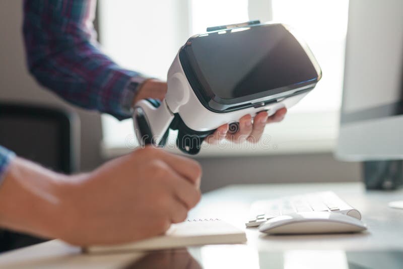 Crop Hands with VR Goggles Making Notes Stock Image - Image of ...