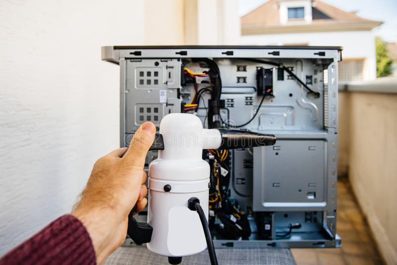 Crop Man Cleaning Computer with Vacuum Pump Stock Photo - Image of pump ...