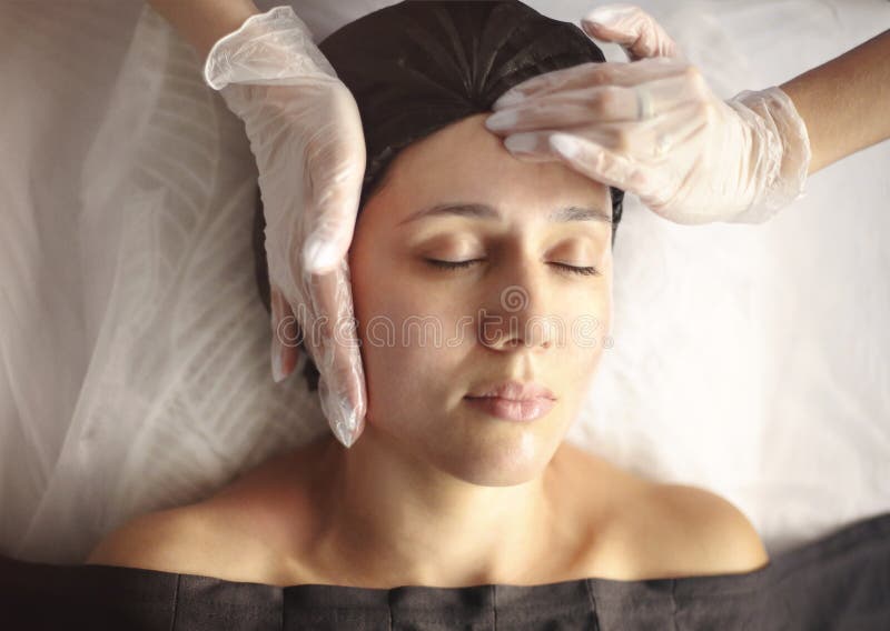 Crop Massage Therapist Massaging Face Of Client Stock Image Image Of