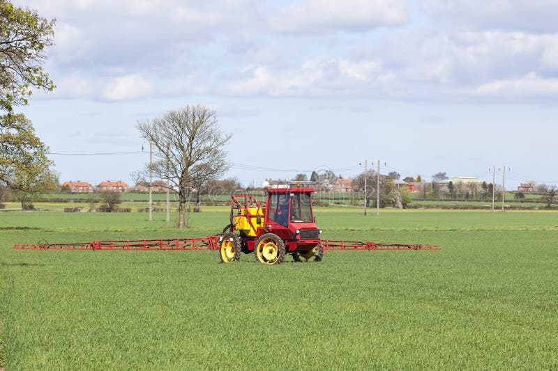Agricultural Machine Spraying Crops Stock Photo - Image of machinery ...
