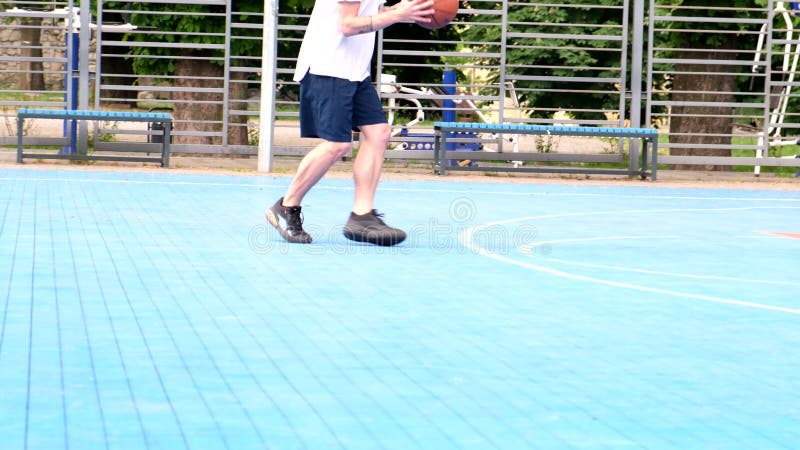 Crop Video of Man Legs Playing Basketball Stock Footage - Video of city ...