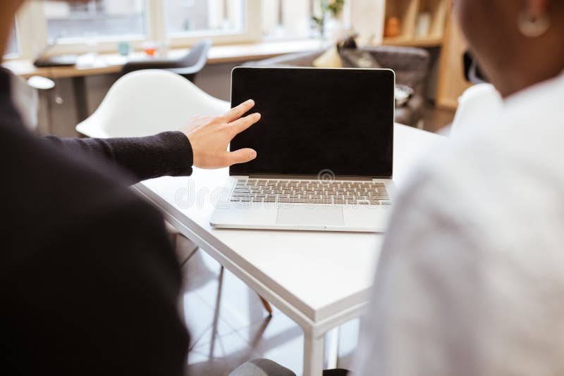 Cropped Backview Image of Two Young Students Using Laptop Stock Photo ...
