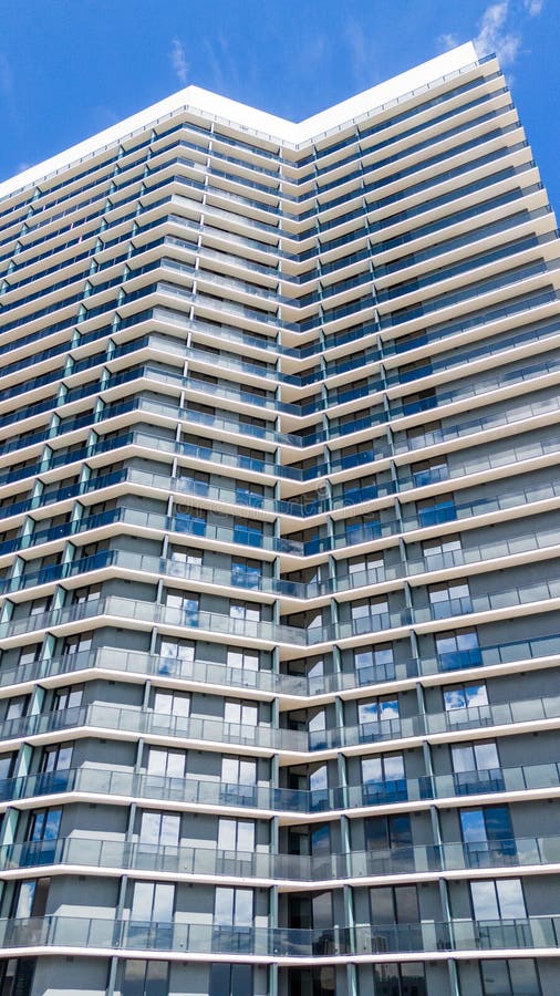 Cropped Bottom View of Remarkable Super-tall Building with Modern ...