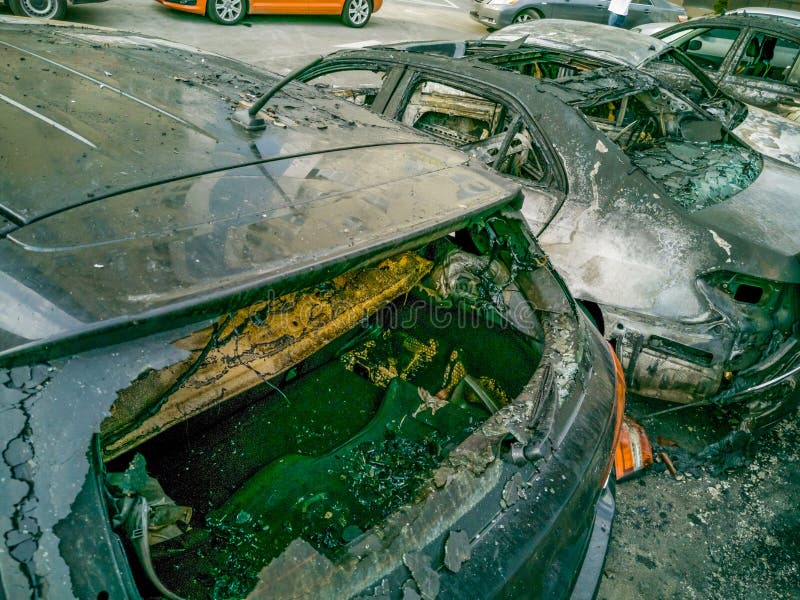 A Cropped Front View of a Burned and Abandoned Rusty Cars Stock Image ...