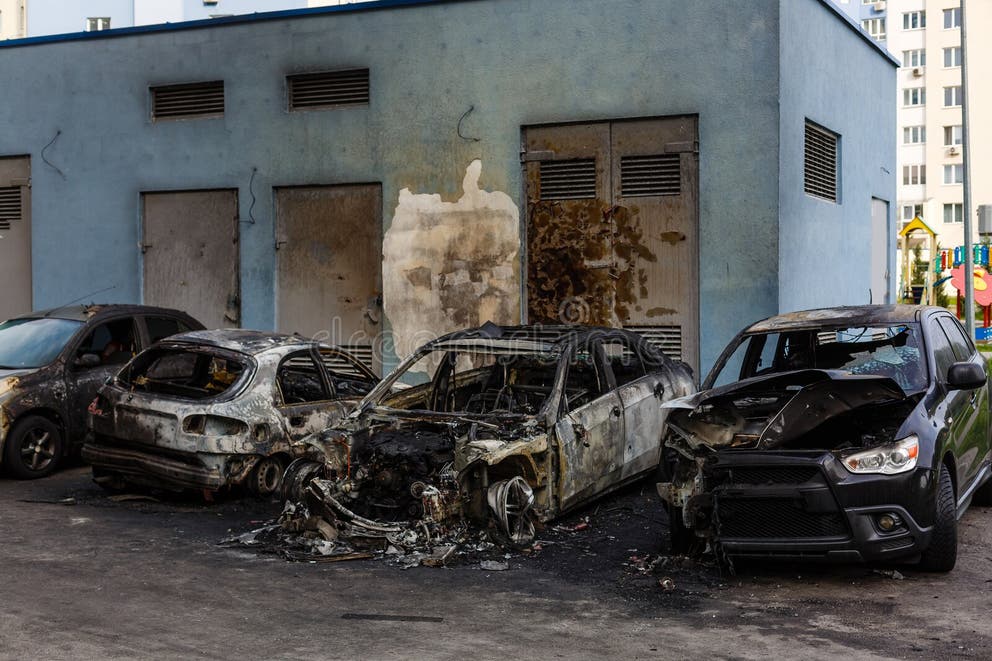 A Cropped Front View of a Burned and Abandoned Rusty Cars Stock Image ...