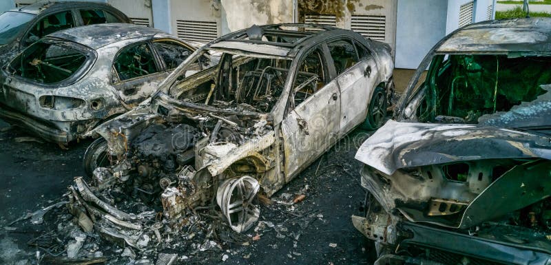 A Cropped Front View of a Burned and Abandoned Rusty Cars Stock Photo ...