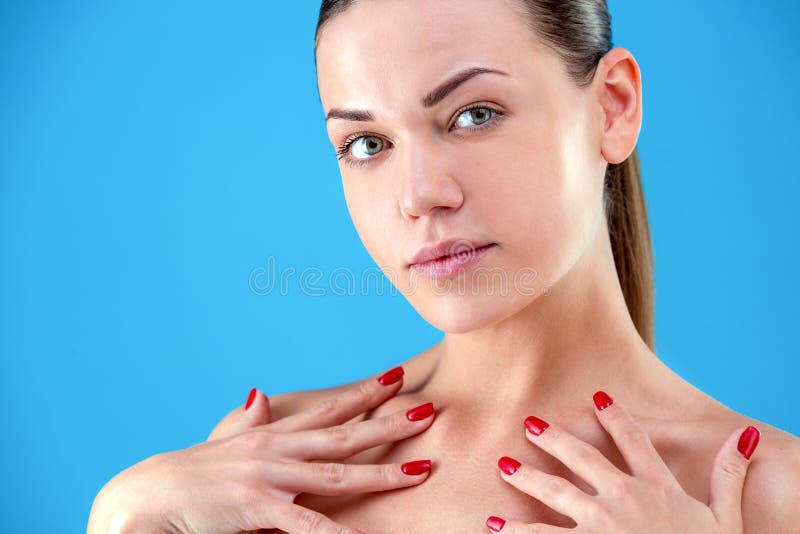 Cropped Frontview of Model Touching Her Face and Neck Tenderly ...