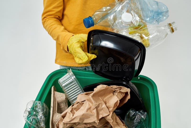 Cropped Girl Holding Plastic Garbage Over Dustbin. Stock Photo - Image ... Cropped Girl Holding Plastic Garbage Over Dustbin. Stock Photo - Image ...