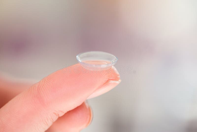 Cropped Hand Holding Contact Lens Stock Image - Image of finger ...
