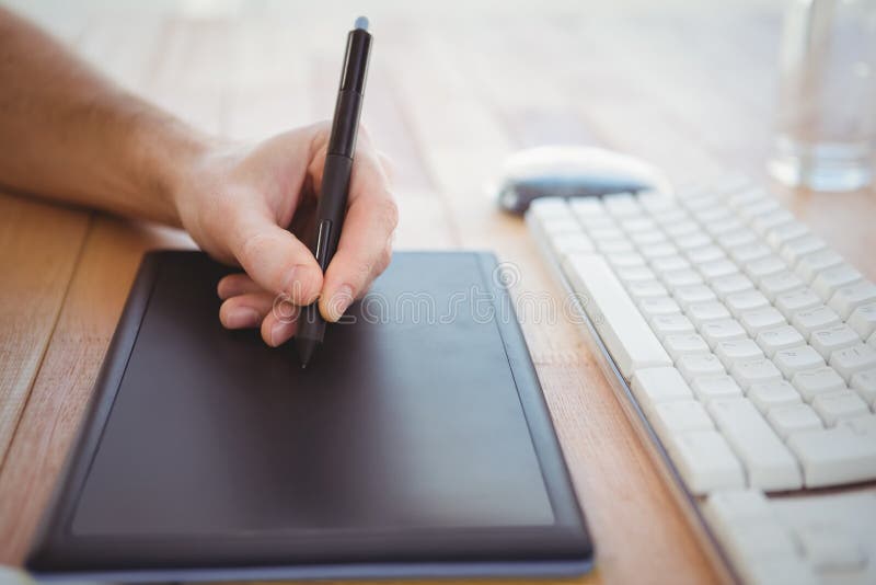 Cropped Hand of Man Using Graphics Tablet Stock Photo - Image of ...