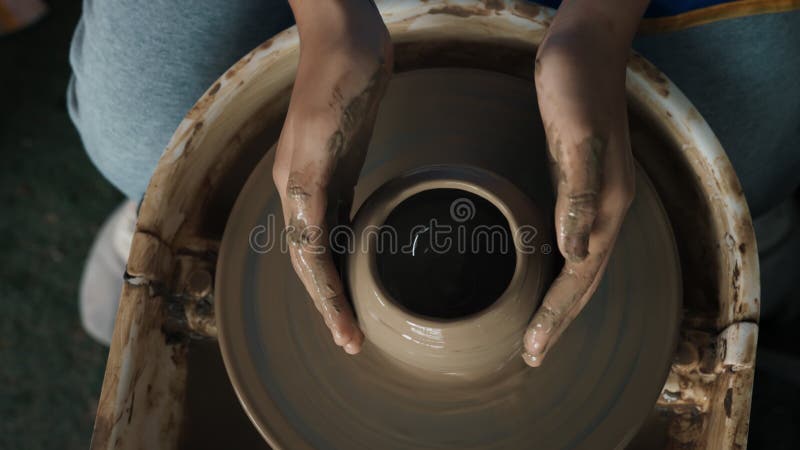 Artisan Craftsmanship. Expert Hands Shaping a Beautiful Bowl on a ...