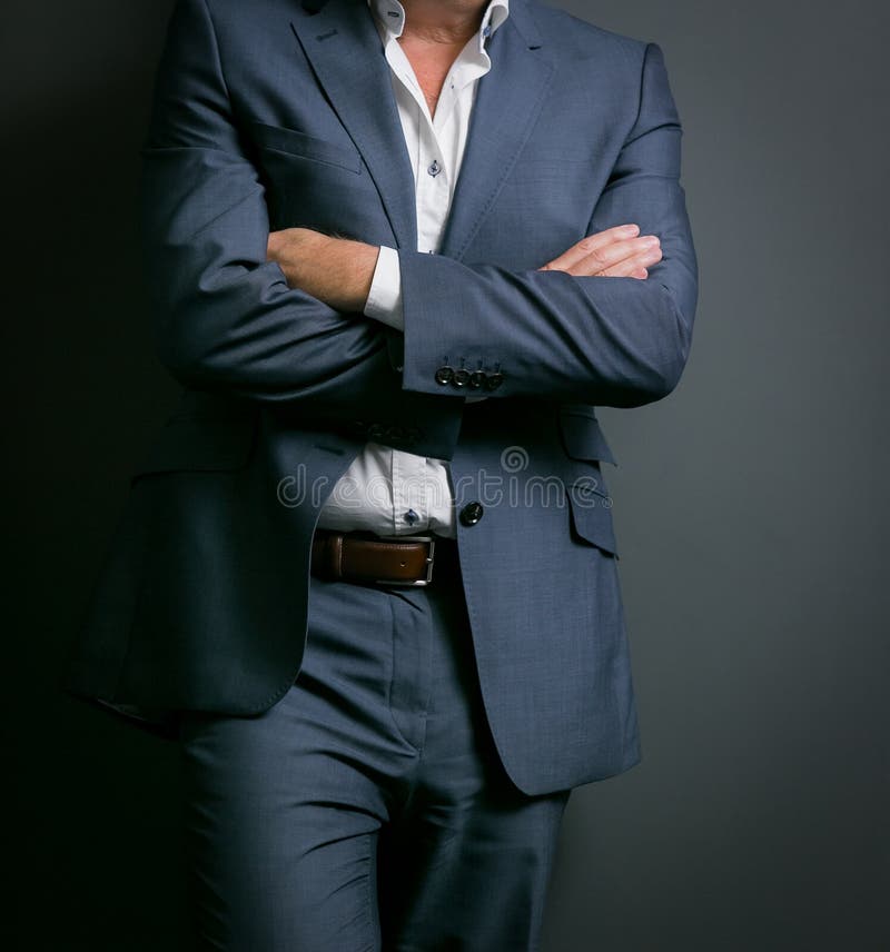 Cropped Head Man Standing in a Smart Suit with Folded Arms Stock Image ... Cropped Head Man Standing in a Smart Suit with Folded Arms Stock Image ...