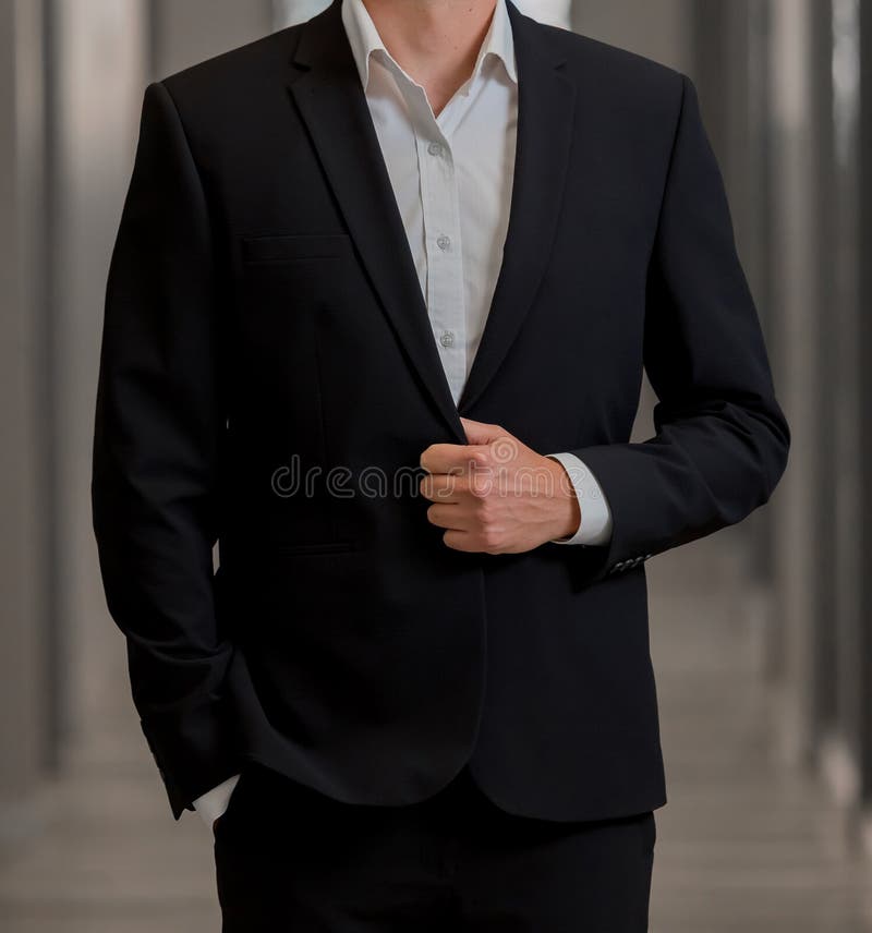 Cropped Head Man Standing in a Smart Suit with Folded Arms Editorial ... Cropped Head Man Standing in a Smart Suit with Folded Arms Editorial ...