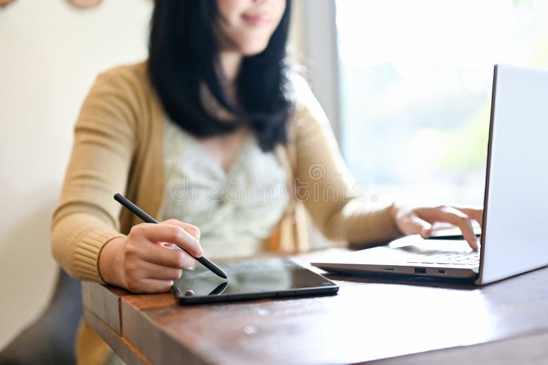 Cropped Image, an Asian Female Remote Working at the Coffee Shop Using ...