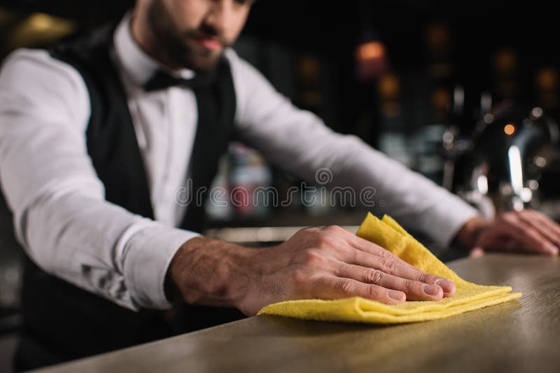Cropped Image of Bartender Cleaning Bar Counter Stock Photo - Image of ...