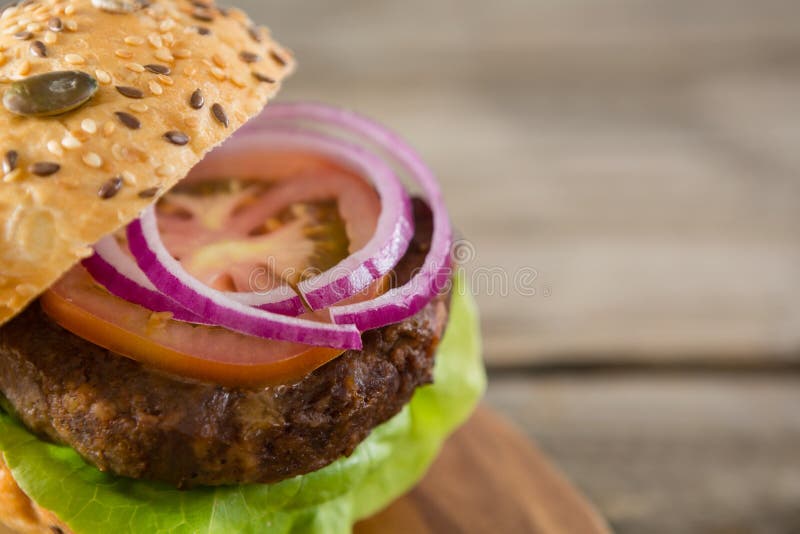 Cropped image of burger stock photo. Image of black, onion - 95869174