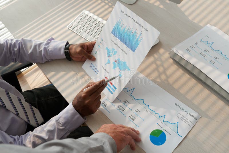 Discussing statistics stock image. Image of business - 53222285