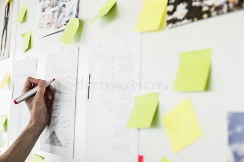 Cropped Image of Businessman S Hand Writing on Paper in Office Stock ...