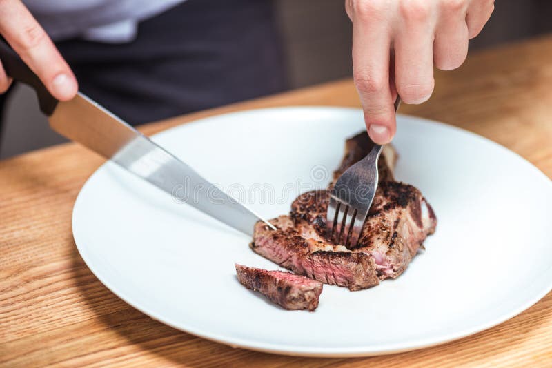 Cropped Image of Chef Cutting Fried Meat with Knife Stock Image - Image ...