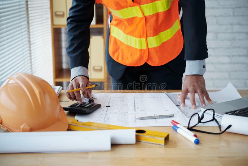 Engineer Checking Blueprint Stock Photo - Image of adult, professional ...