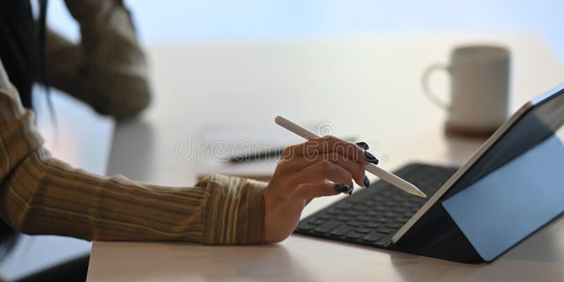 Cropped Image of Creative Woman`s Hands Holding a Stylus Pen and Using ...