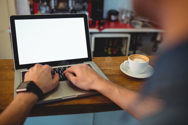 Cropped Image of Customer Typing on Laptop at Cafe Stock Image - Image ...