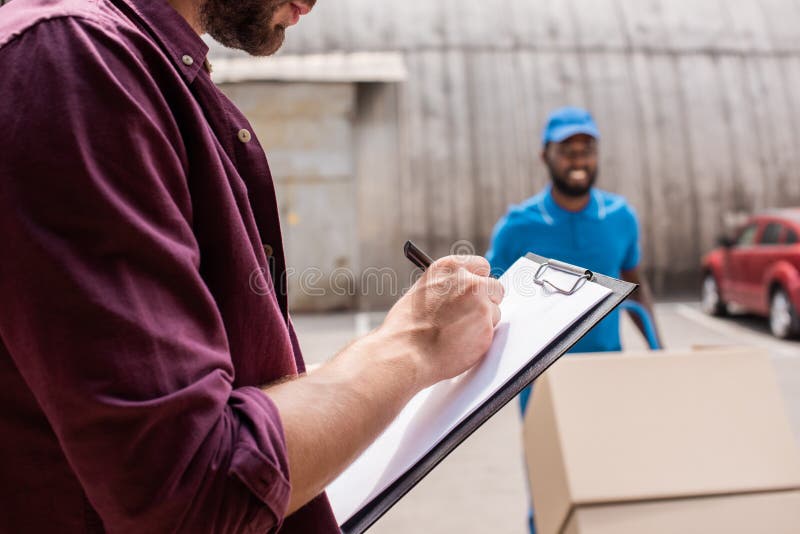 Customer Writing Signing Signature on Paper Contract with Real Estate ...