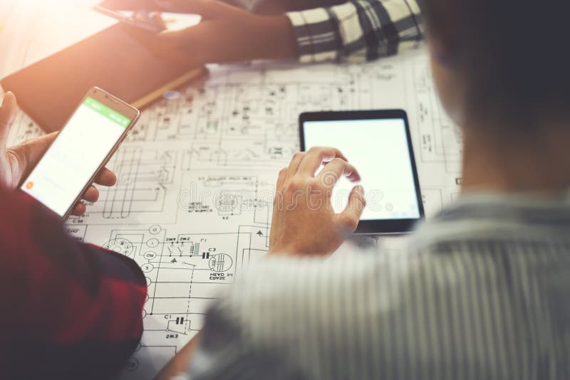 Cropped Image of Designers Crew Using Modern Technology Stock Image ...