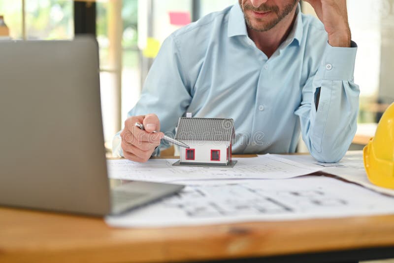Cropped Image of Engineer Man Working with Blueprint, Examining Plans ...