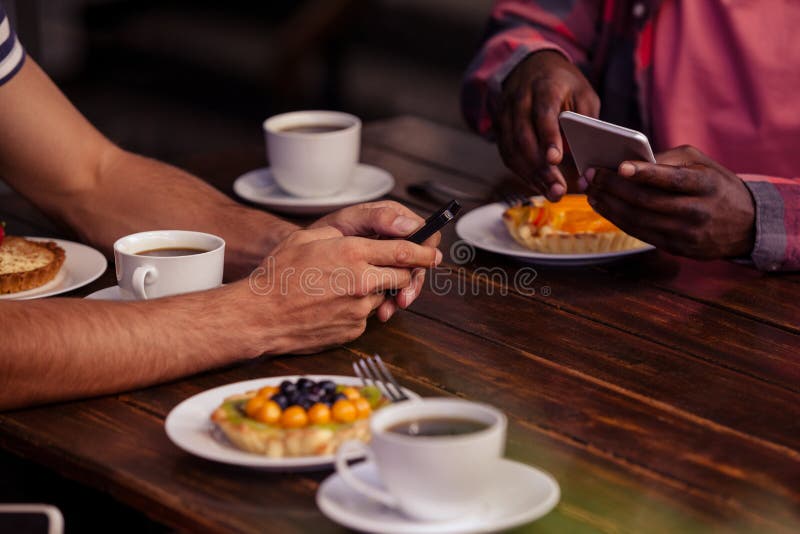 Cropped Image of Friends Eating Pastries and Drinking Coffee Stock ...