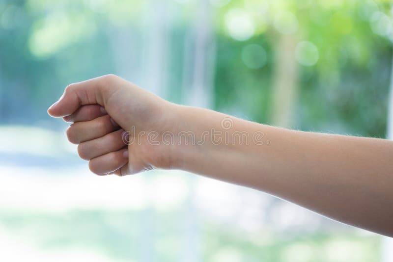 Cropped Image of Hand Clenching Fist Stock Image - Image of caucasian ...