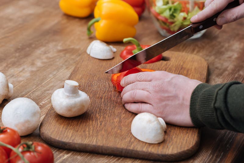 Cropped Image of Man Cutting Bell Pepper Stock Image - Image of ...