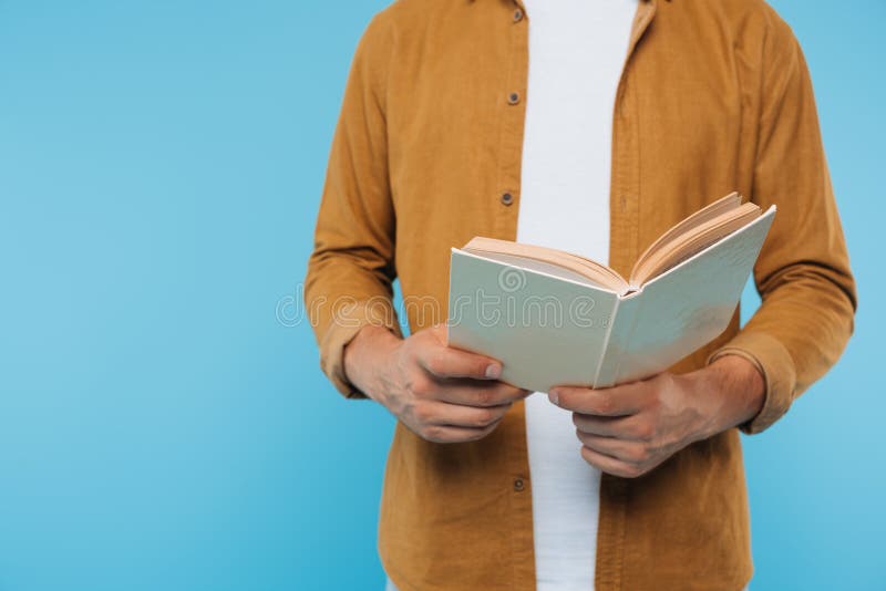 Man Holding Open Book stock image. Image of happy, field - 5146565