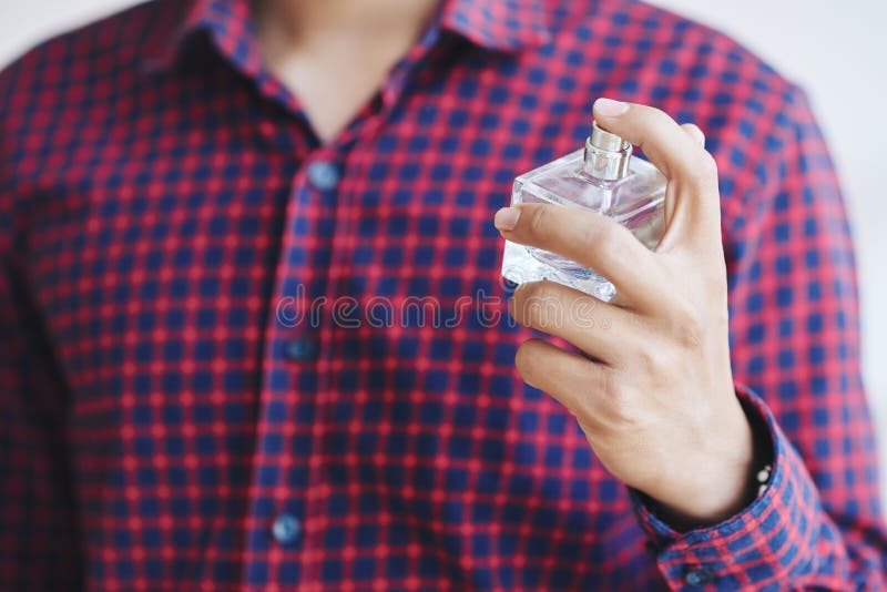 Male Spraying Perfume Cologne Stock Photo - Image of hands, people ...