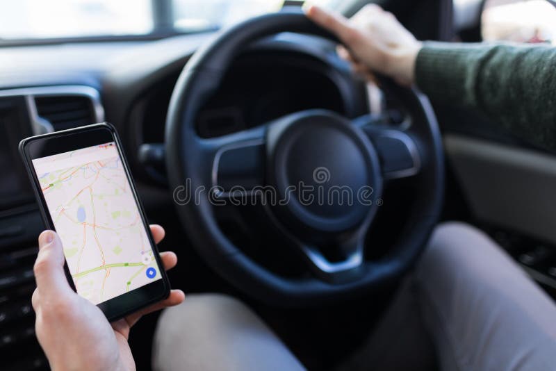 Cropped Image of Man Using Smartphone while Driving Car Stock Image ...