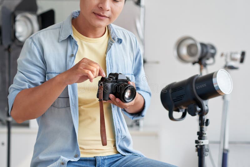 Photographer getting ready stock image. Image of dslr - 126690187
