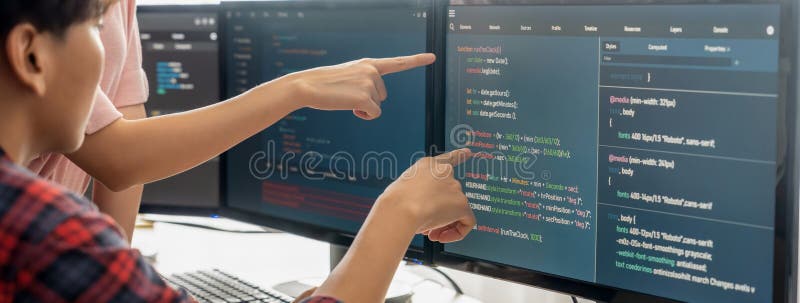 Professional Programer Looking Computer Desktop with Coding Program. AIG42. Stock Image - Image ...