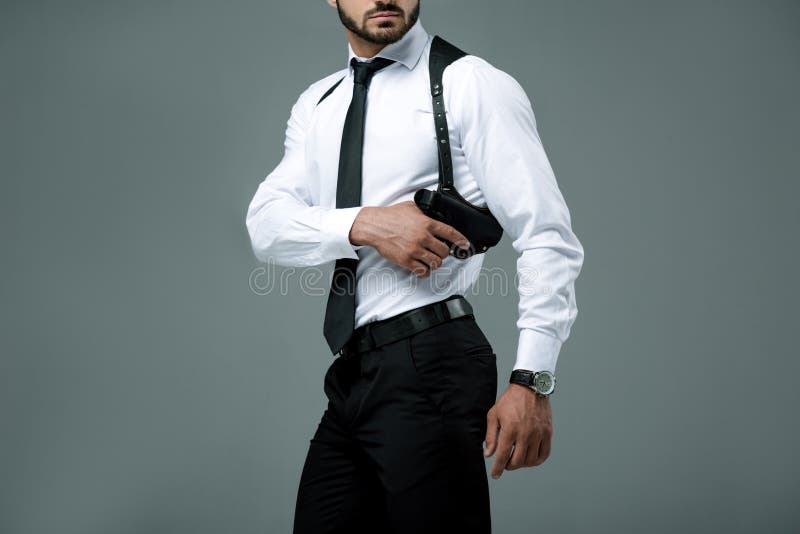 Cropped Image of Security Guard Taking Gun Stock Image - Image of ...