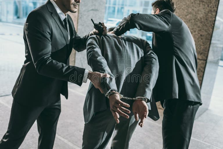 Cropped Image of Security Guards Arresting Stock Image - Image of ...