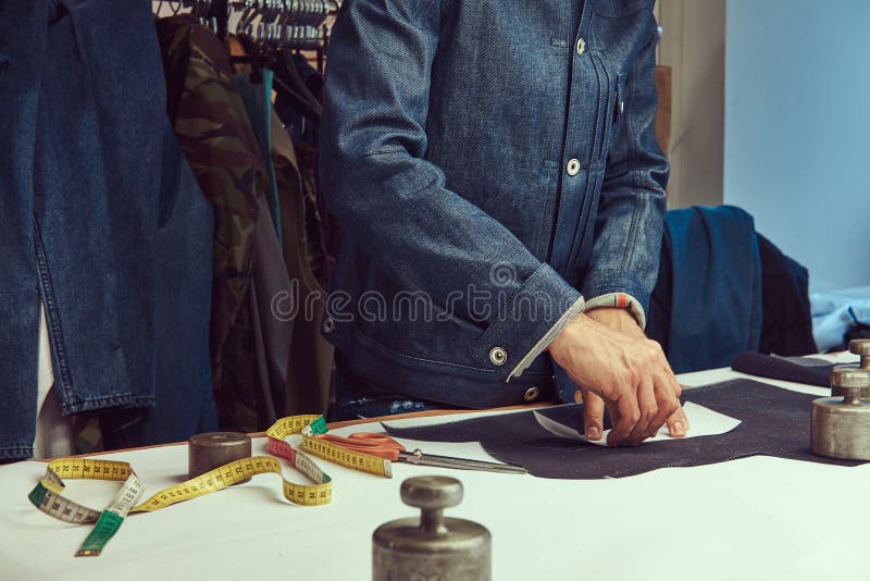 Cropped Image of a Tailor Working with Cloth Samples at Sewing Workshop ...