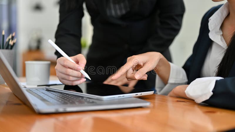 Cropped Image, Two Businesswomen Discussing about Their Business ...