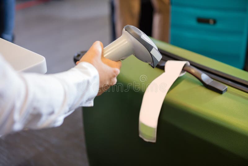 Woman Scanning Tag on Baggage at Airport Check-in Stock Image - Image ...