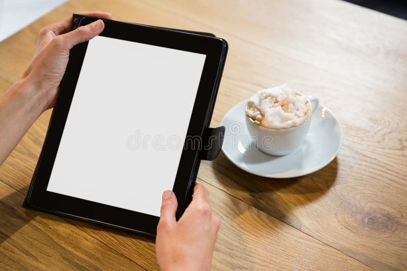 Cropped Image of Woman Using Digital Tablet in Cafe Stock Photo - Image ...